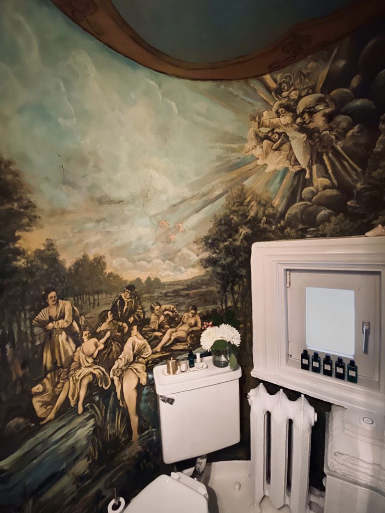 A turret bathroom with a rococo mural | Eat Drink & Be Carrie